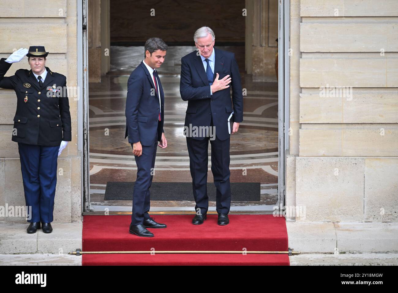 French outgoing Prime Minister Gabriel Attal and her successor Michel ...