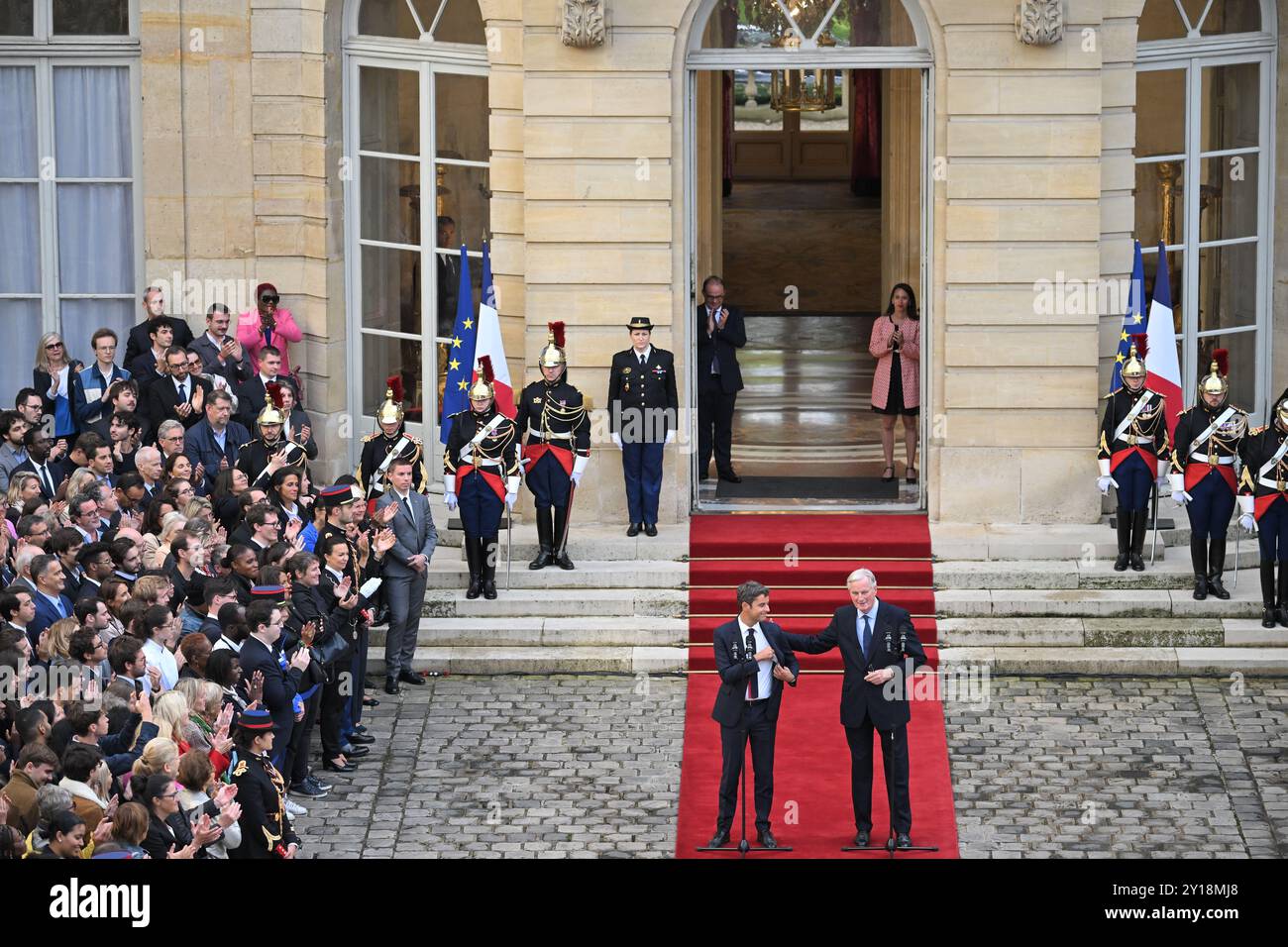 French outgoing Prime Minister Gabriel Attal and her successor Michel ...