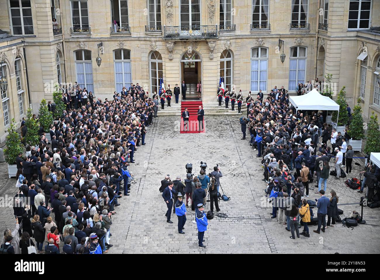 French outgoing Prime Minister Gabriel Attal and her successor Michel ...