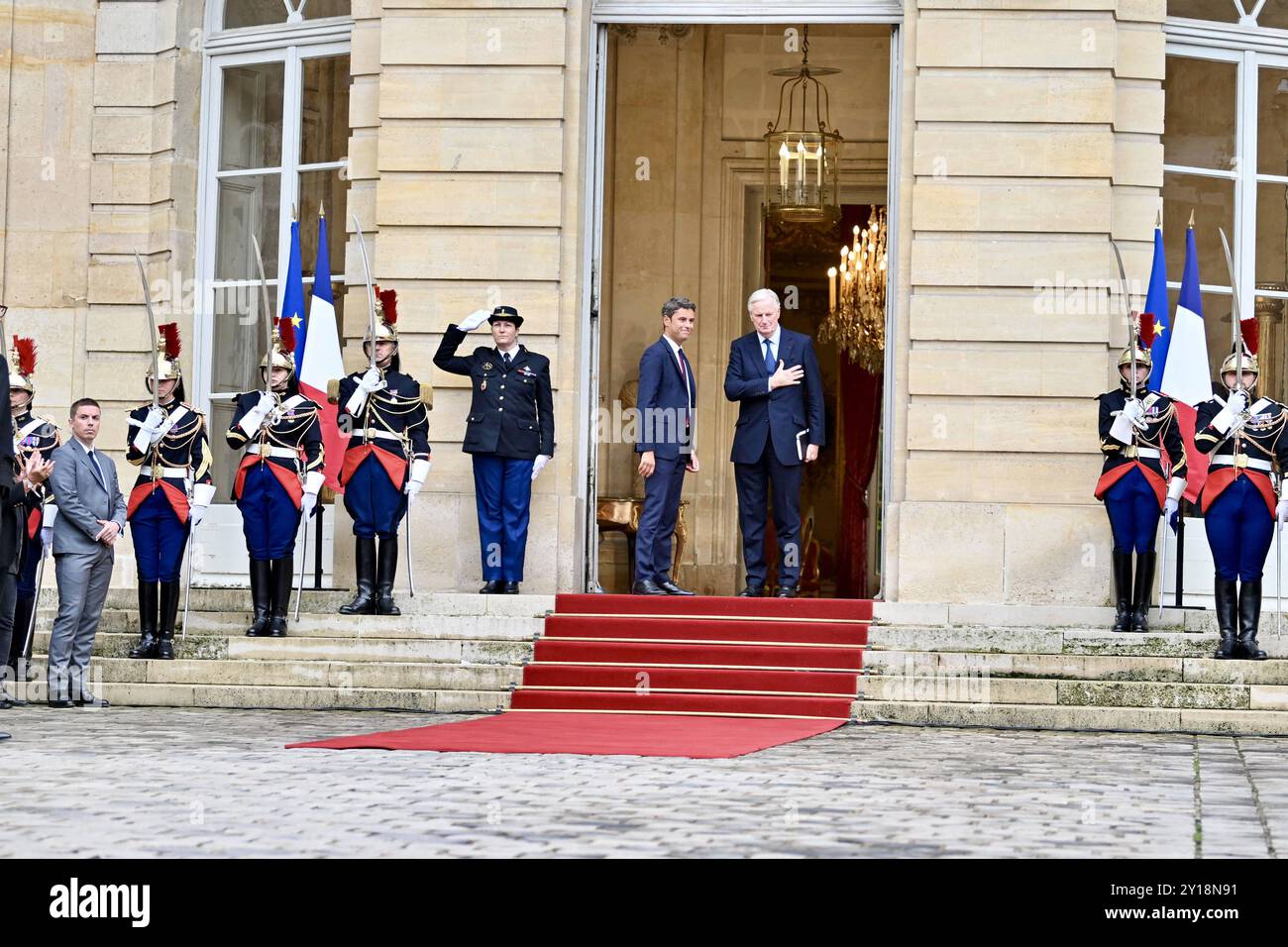 French outgoing Prime Minister Gabriel Attal and her successor Michel ...