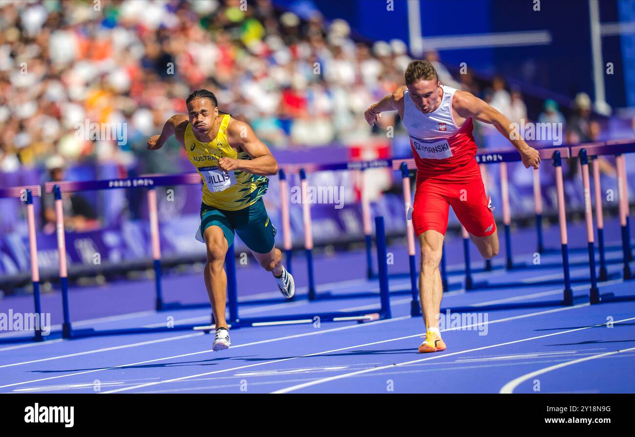 Tayleb Willis participating in the 110 meters hurdles at the Paris 2024 ...