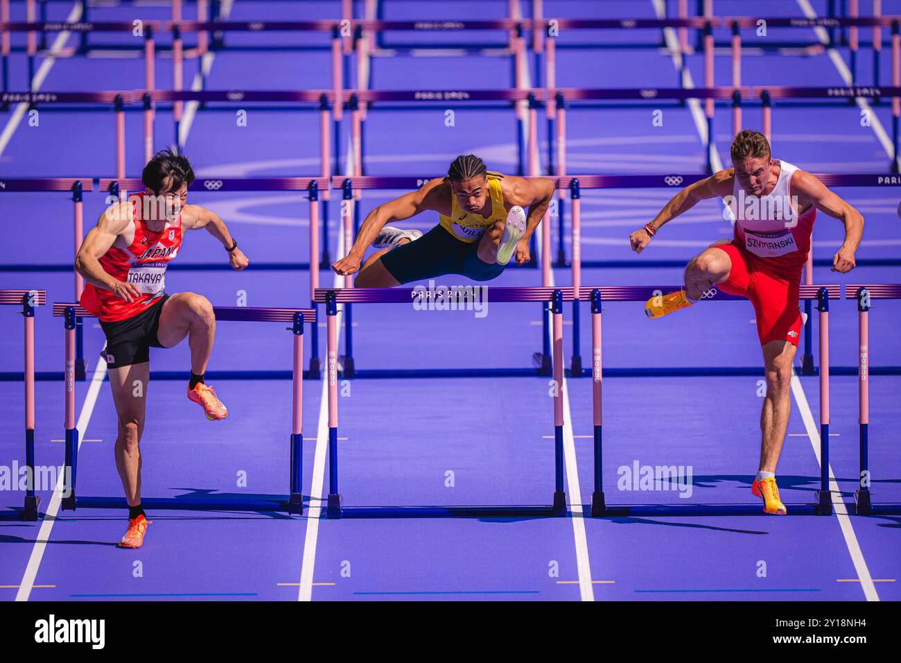 Tayleb Willis participating in the 110 meters hurdles at the Paris 2024 ...