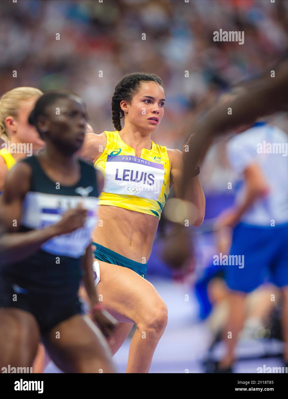 Torrie Lewis participating in the 200 meters at the Paris 2024 Olympic ...