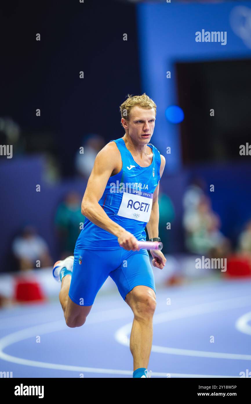 Vladimir Aceti participating in the 4x400 meters relay at the Paris ...