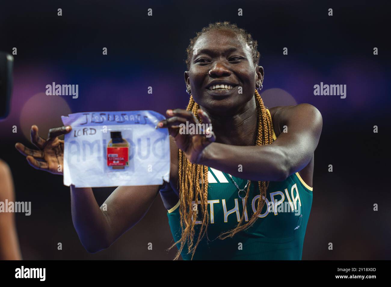 Tsige Duguma participating in the 800 meters at the Paris 2024 Olympic ...