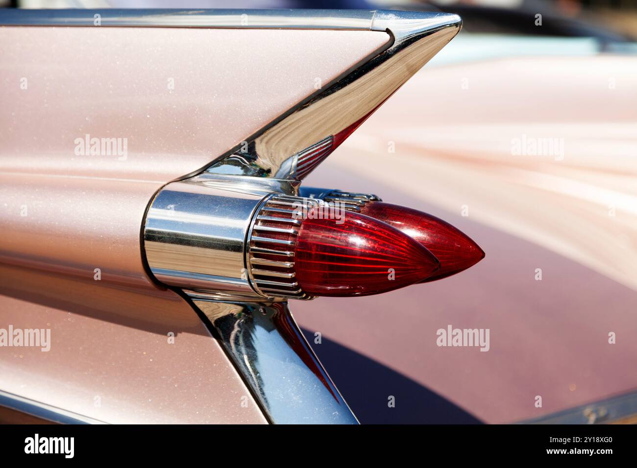 red fin lights by old car Stock Photo - Alamy