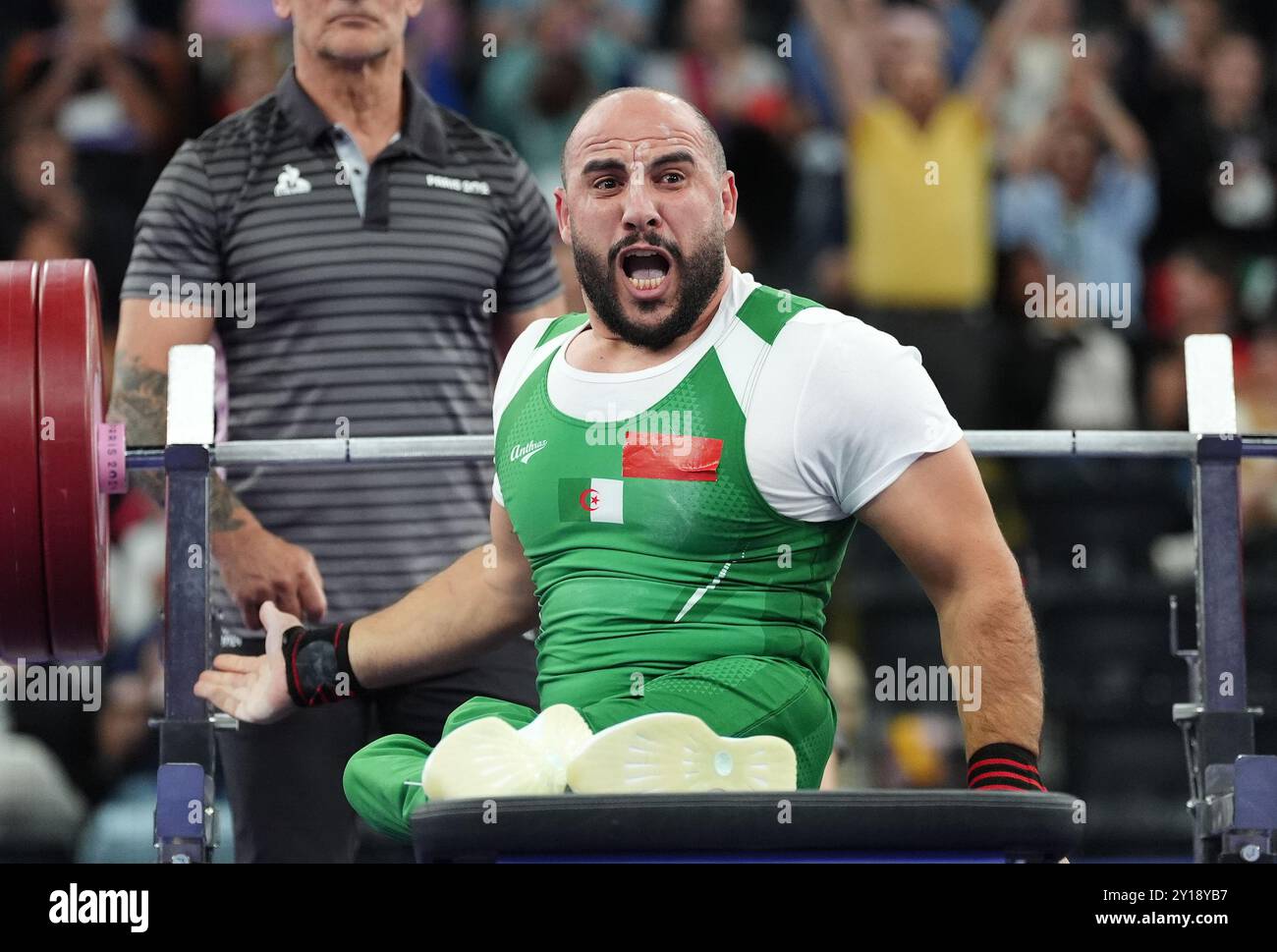 Algeria’s Hocine Bettir celebrates after a successful lift during the ...