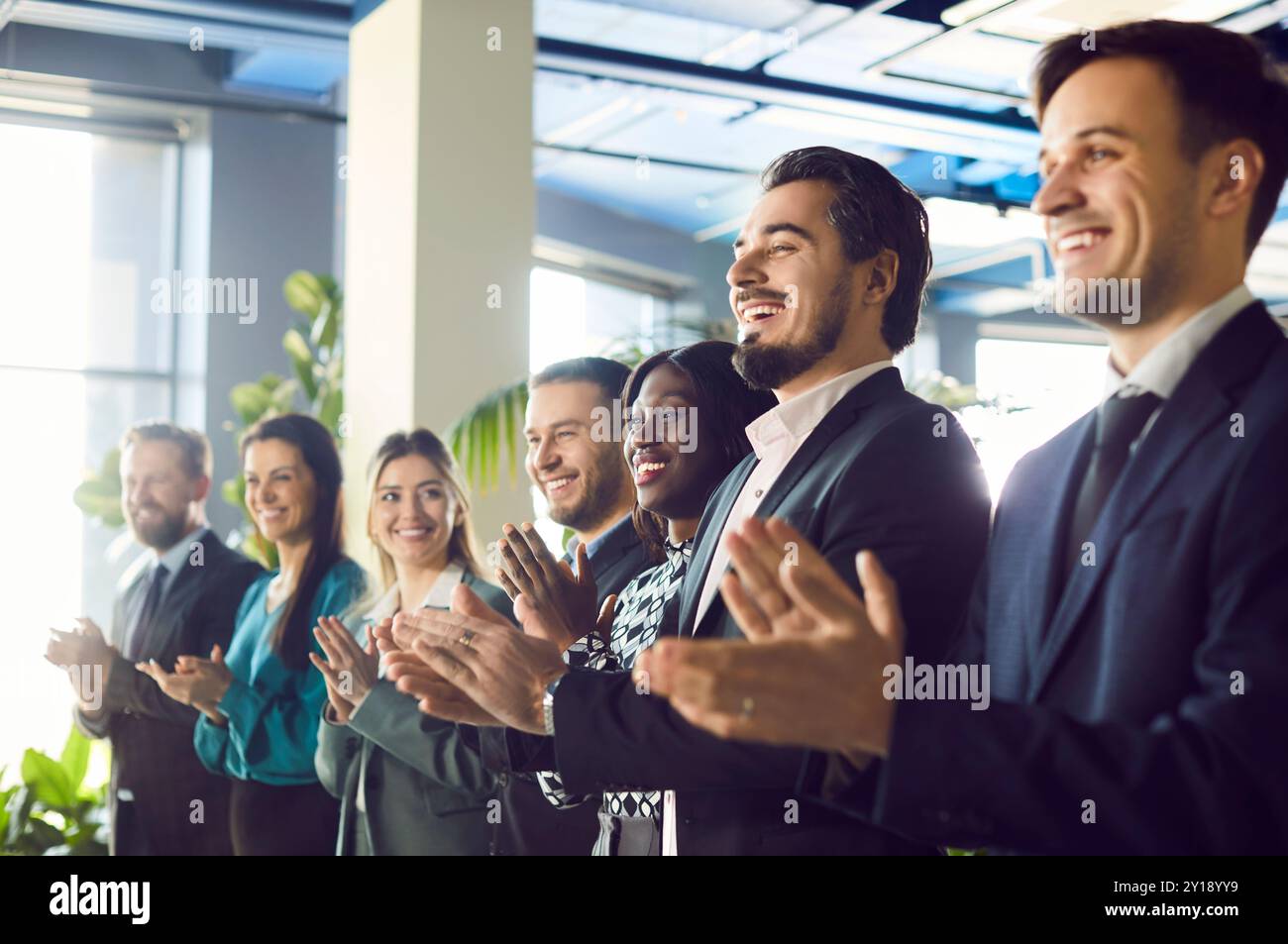 Enthusiastic audience clapping hands hi-res stock photography and ...
