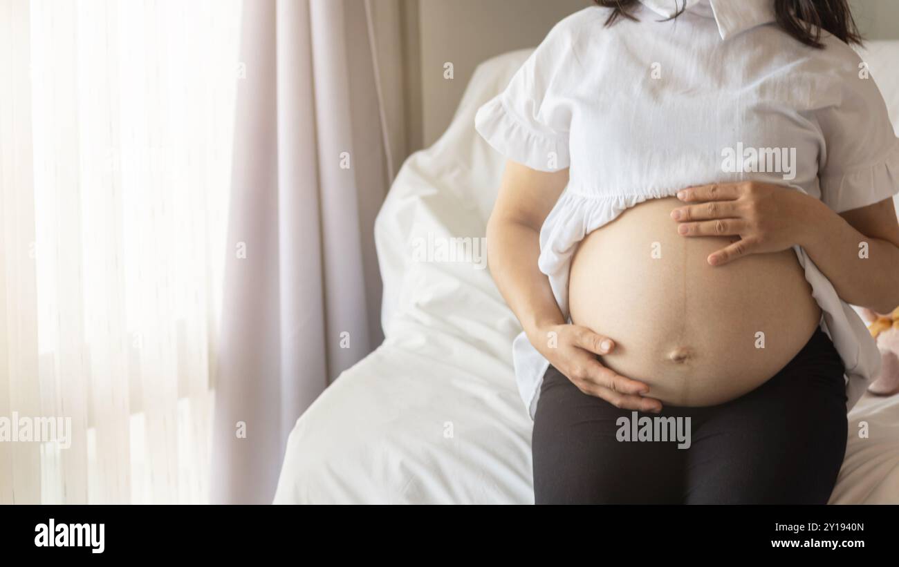 Baby in womb hi-res stock photography and images - Alamy