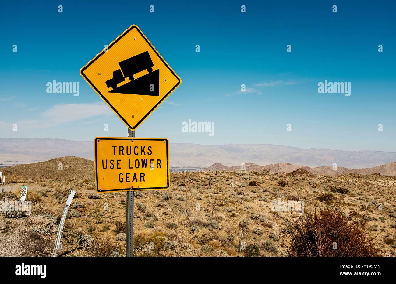Warning sign alerting truck drivers to steep decline in desert Stock ...