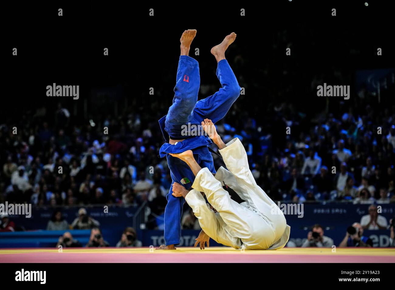 Iran's Seyed Meysam Banitaba Khoram Abadi, right, and Algeria's ...