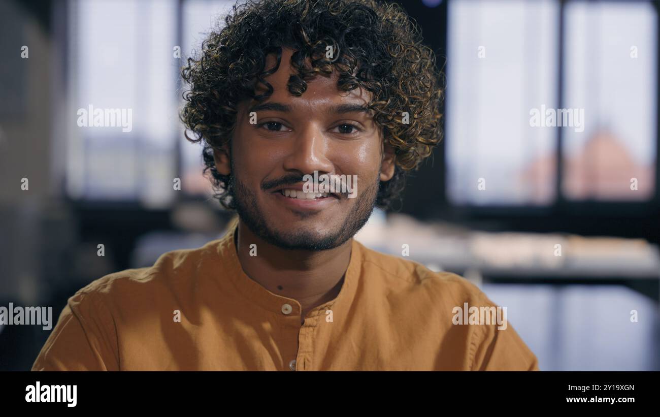 Portrait of happy Indian Arabian ethnic muslim guy creative designer ...