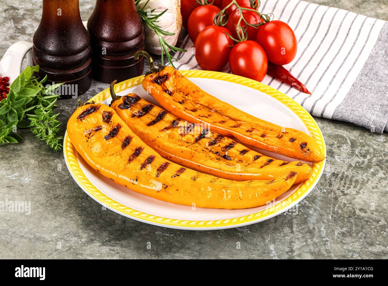 Grilled yellow ramiro pepper snack appetizer Stock Photo - Alamy