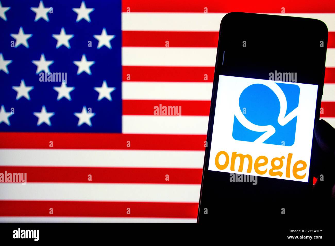 In this photo illustration, an Omegle logo seen displayed on a ...