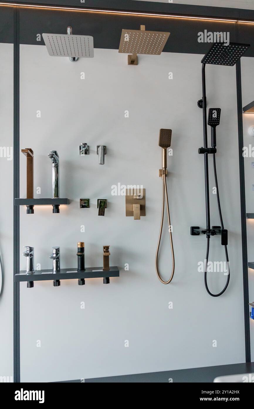 Elegant Display of Modern Shower Fixtures and Faucets Stock Photo - Alamy