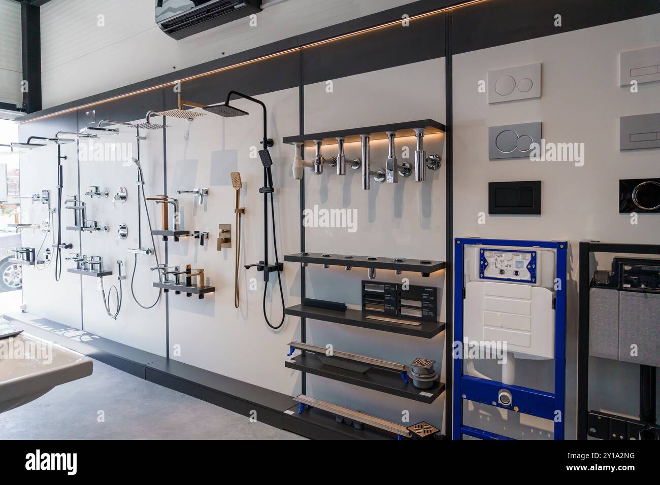 Elegant Bathroom Fixture Display in Modern Showroom Stock Photo - Alamy