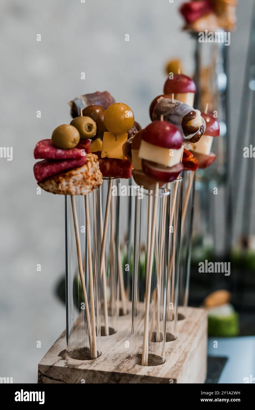 Elegant Display of Gourmet Appetizer Skewers on Wooden Stand Stock ...