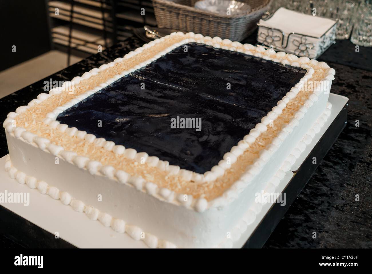 Elegant Rectangular Cake with Blue Frosting and Delicate White Piping ...