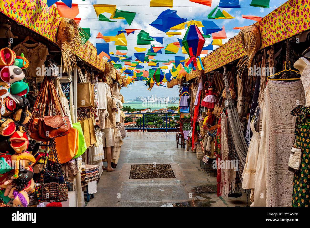Brazilian street with shops for tourists in Olinda with a view of the ...