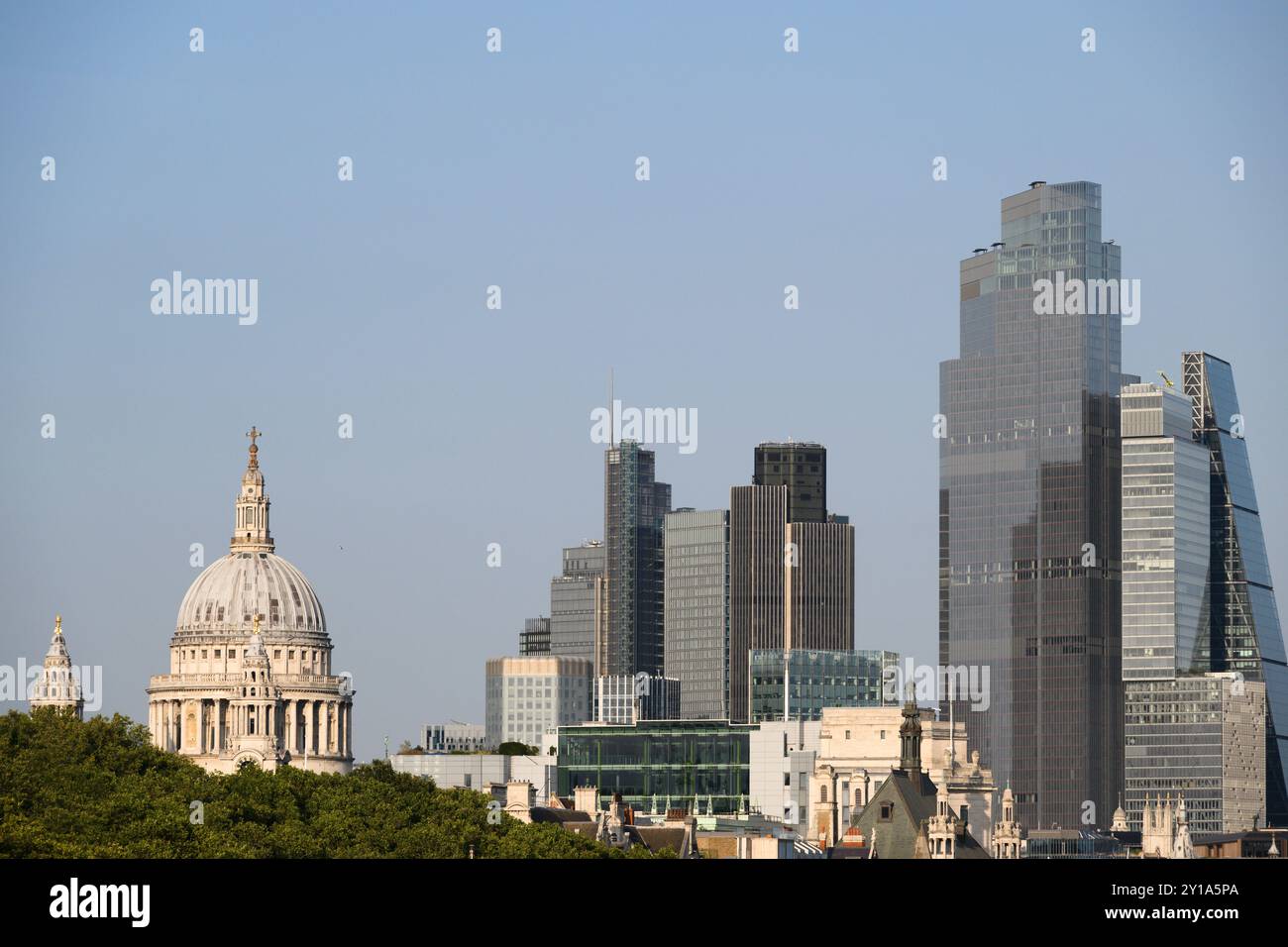 The dome of St. Pauls Cathedral and the skyscrapers of the City of ...
