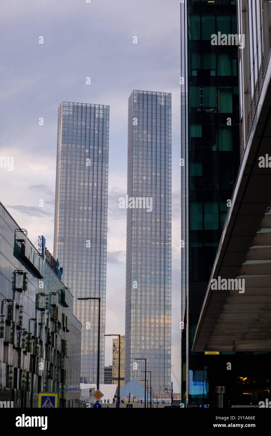 Modern Moscow City towers against a blue sky. Tall glass skyscrapers ...