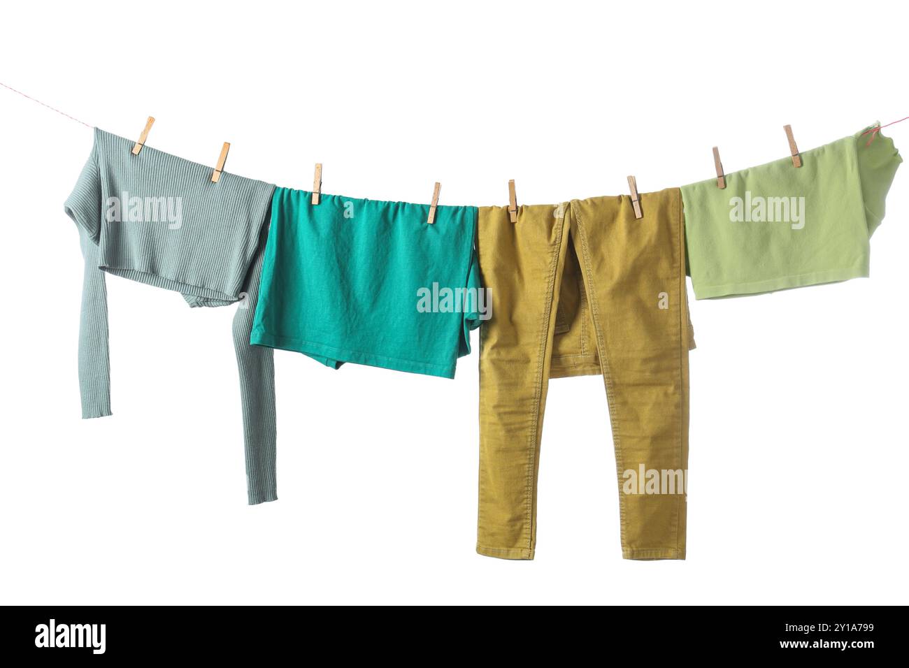 Different clothes hanging on rope against white background Stock Photo ...