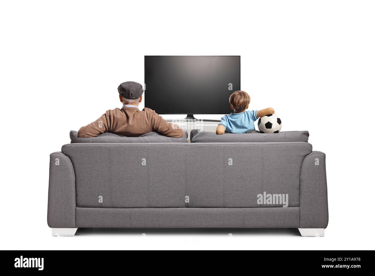 Rear view shot of a grandfather and grandson watching tv isolated on ...