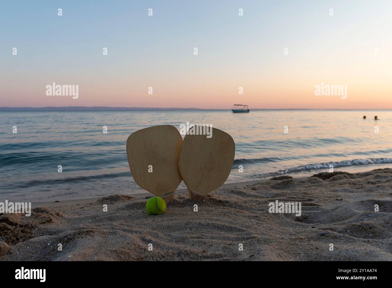 Beach tennis, beach paddle ball. Beach rackets and ball on the beach ...