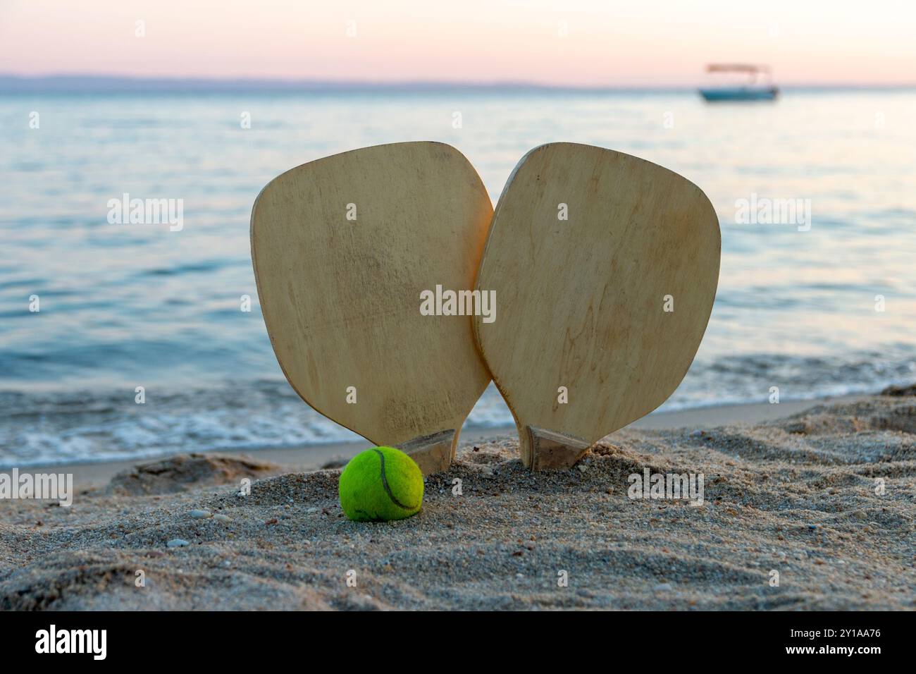 Beach tennis, beach paddle ball. Beach rackets and ball on the beach ...