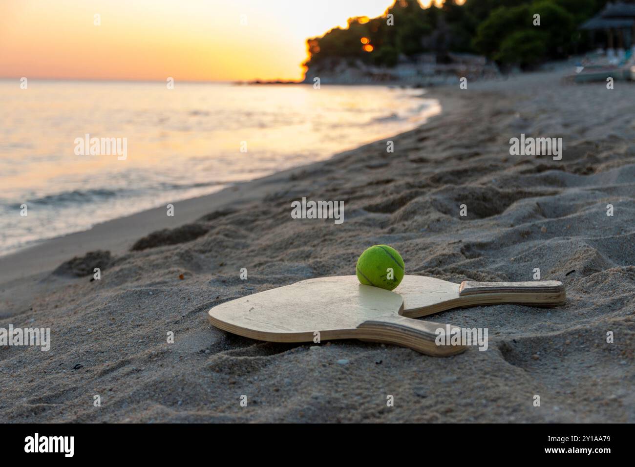 Beach tennis, beach paddle ball. Beach rackets and ball on the beach ...