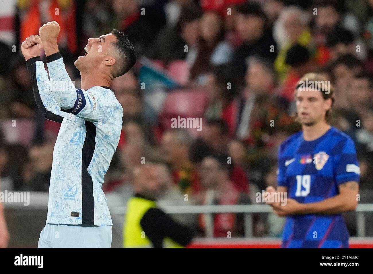 Portugal's Cristiano Ronaldo celebrates after scoring his side's second ...