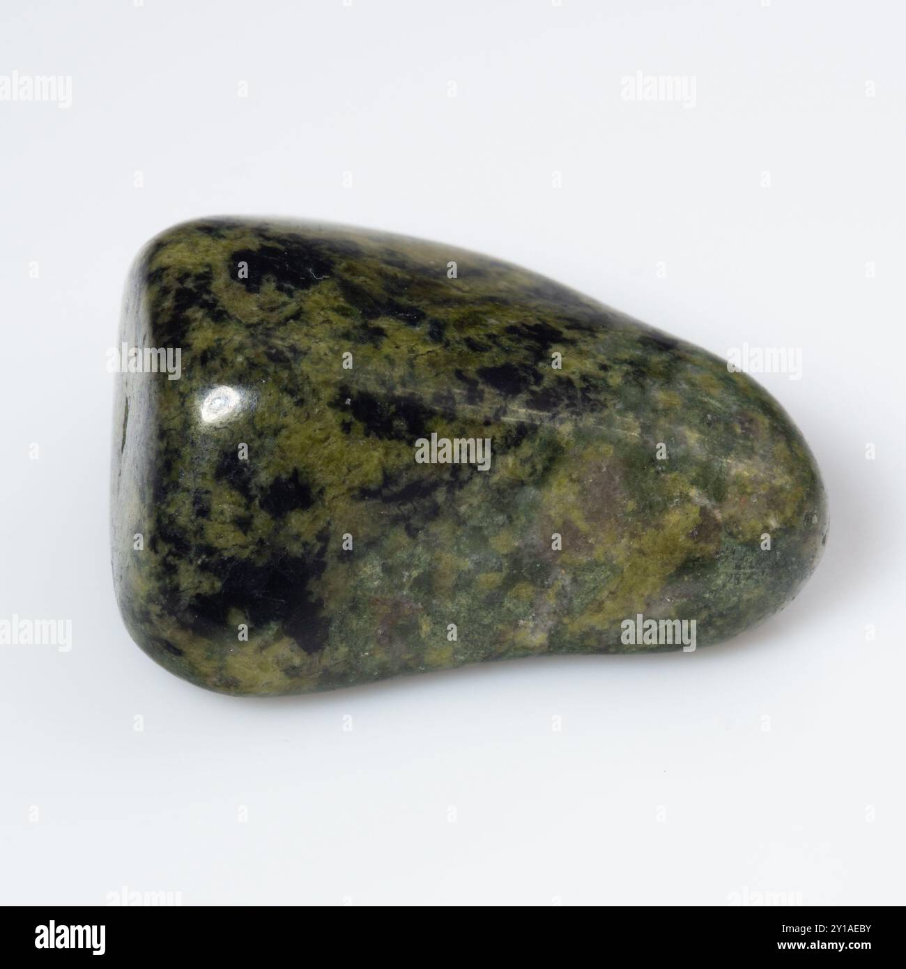 Elegant Polished Serpentine Gemstone on Pristine White Background Stock ...