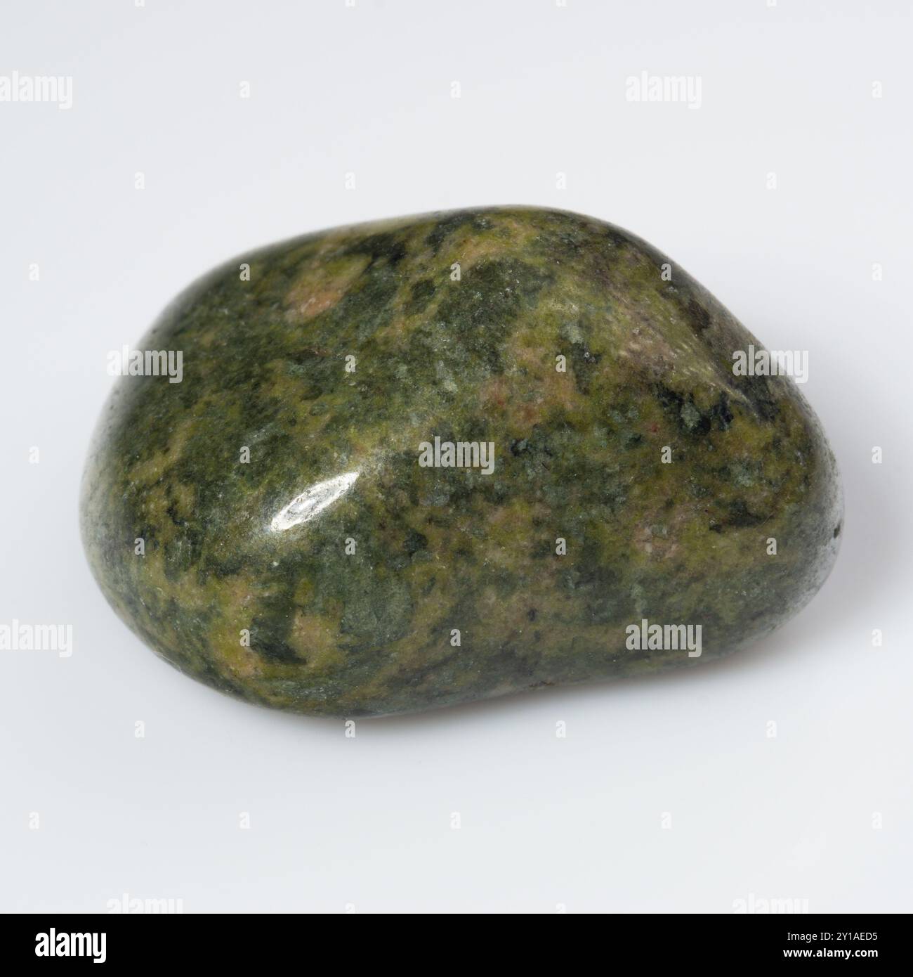 Vibrant Serpentine Gemstone with Smooth Polished Surface on a Subtle ...