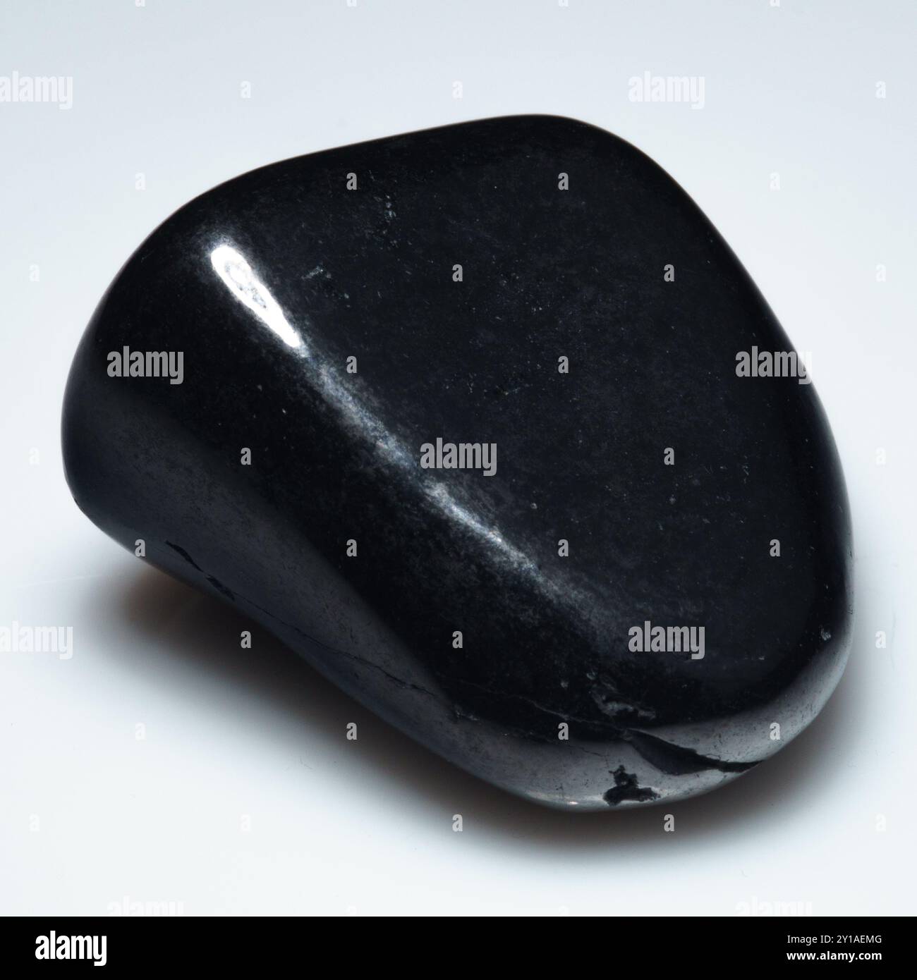 Elegant Shungite Gemstone on Pristine White Background Stock Photo - Alamy