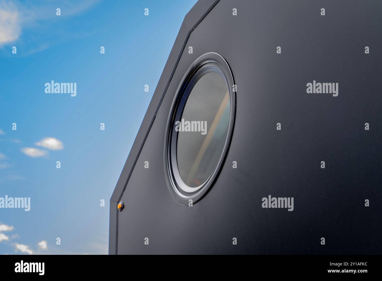 detail of aluminum truck camper with a round porthole window Stock ...