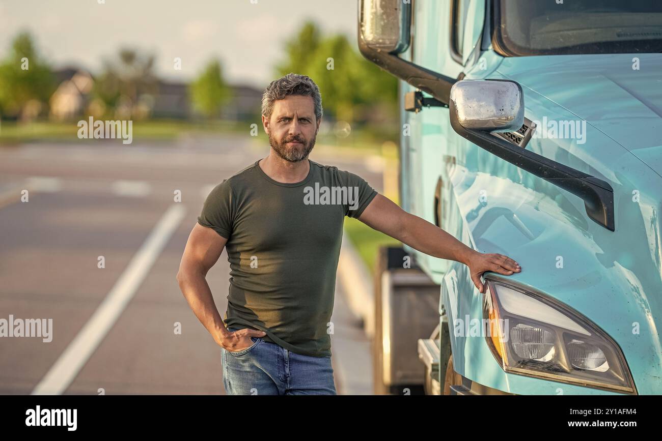 man driver near lorry truck. Truck driver. Trucking owner ...