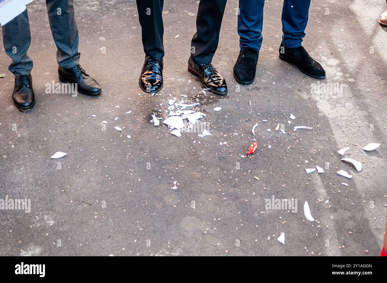 Festive Tradition of Shattered Ceramic on Pavement During Outdoor ...