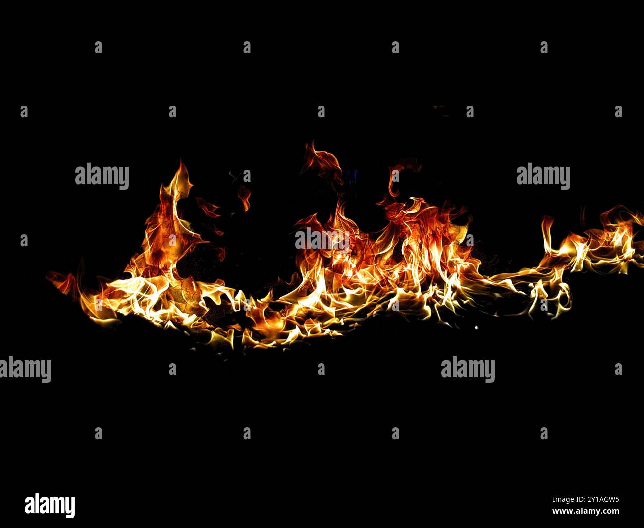 Vivid flames ripple and sway in an abstract background, creating a ...