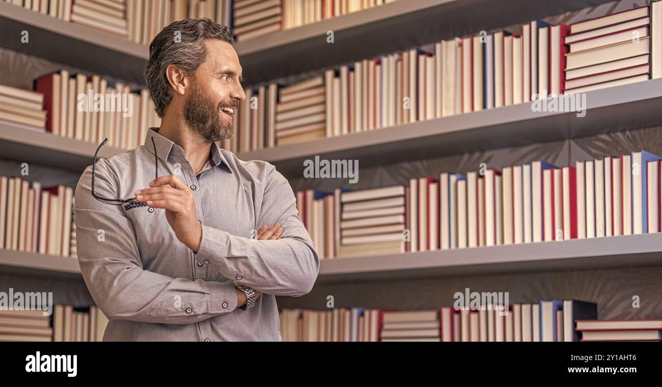 man teacher tutor at bookstore library getting knowledge and education ...