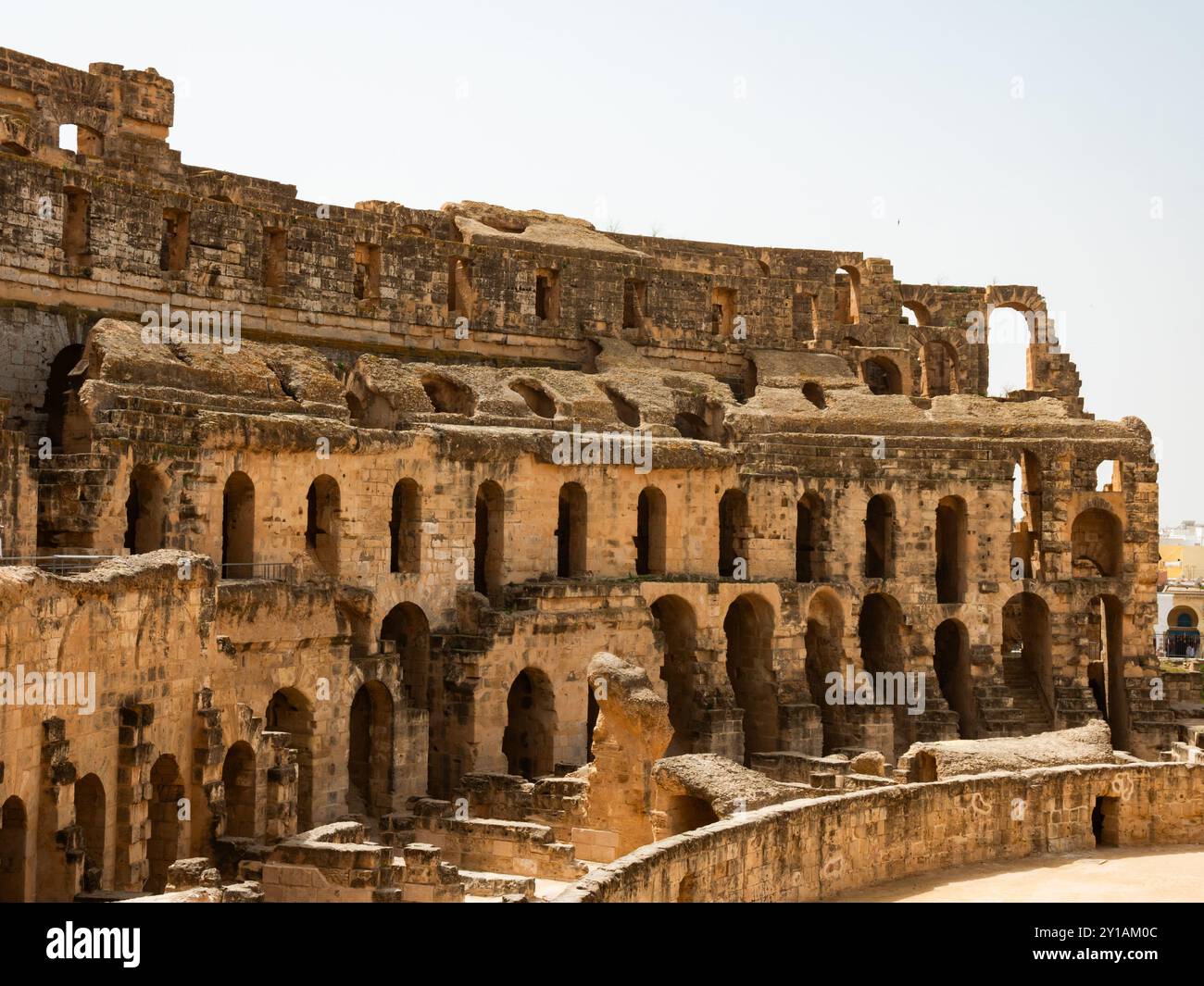Arches in the exterior walls of Roman amphitheatre in El Jem, Tunisia ...