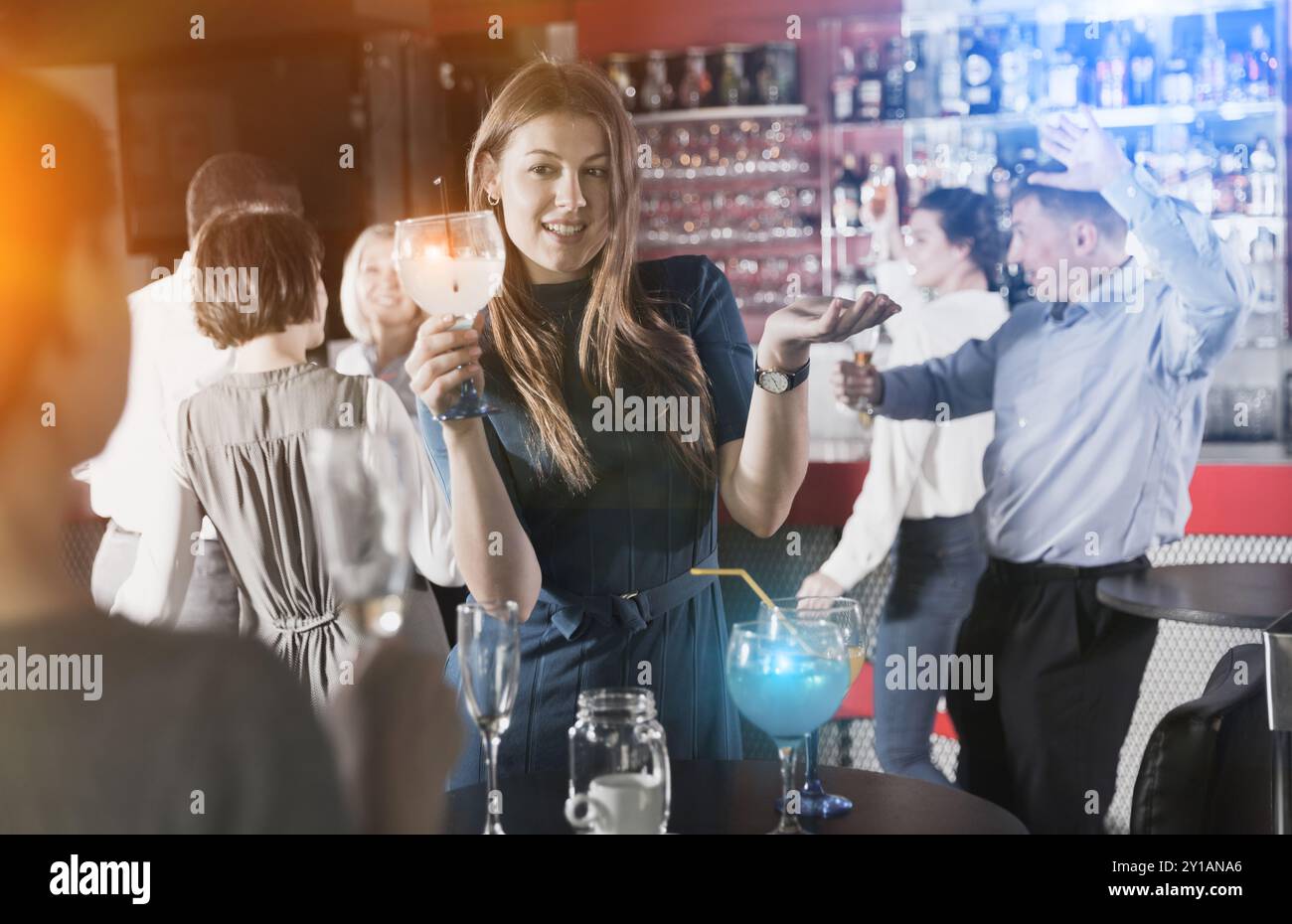 People dancing drinking alcohol hi-res stock photography and images - Alamy