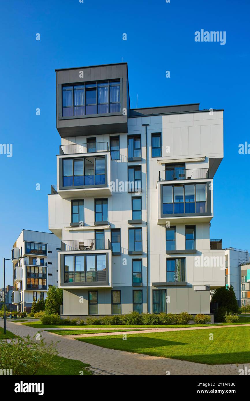 New modern block of flats in green area. residential apartment with ...