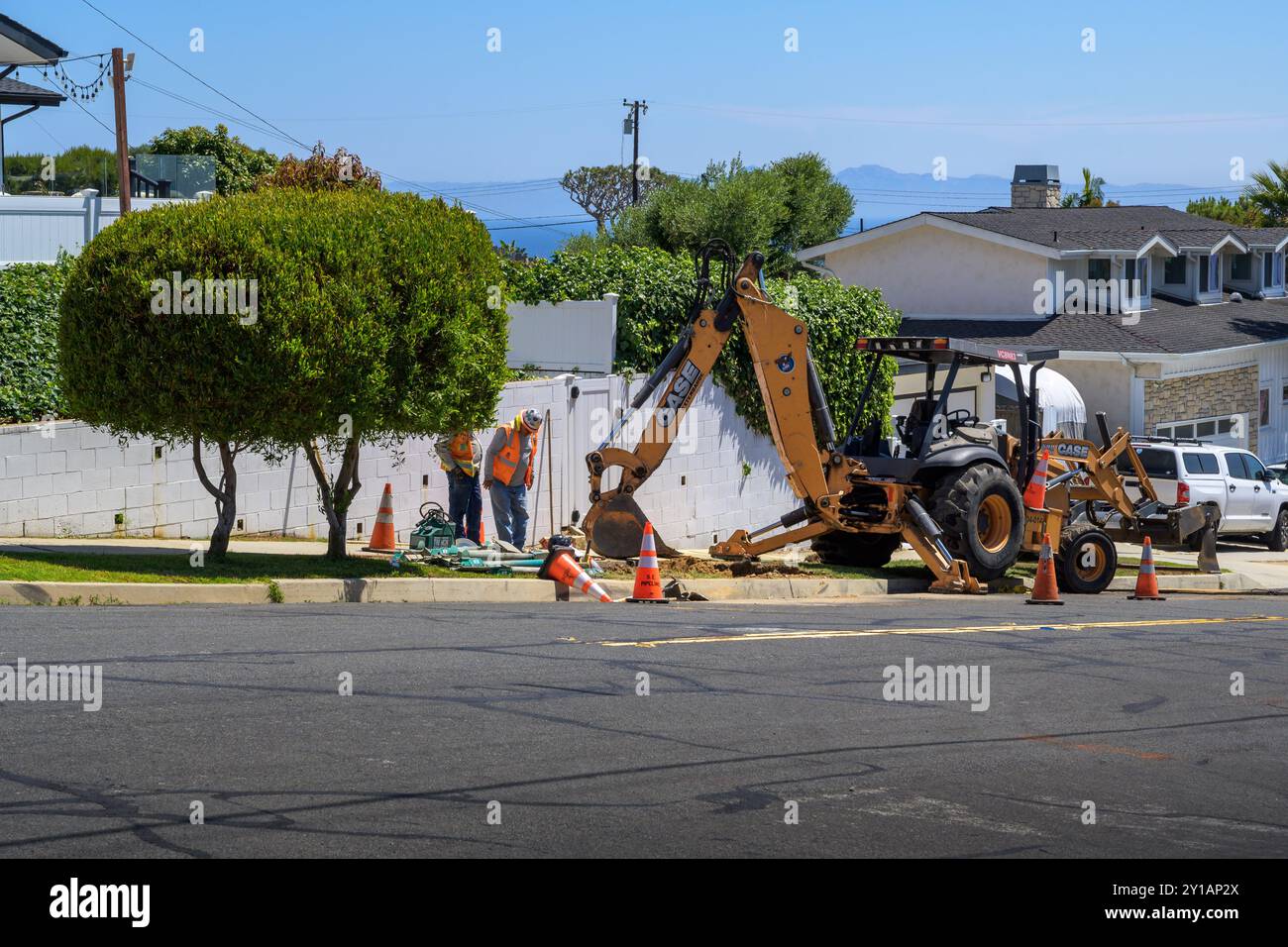 Road works digging construction in residential streets California Stock ...