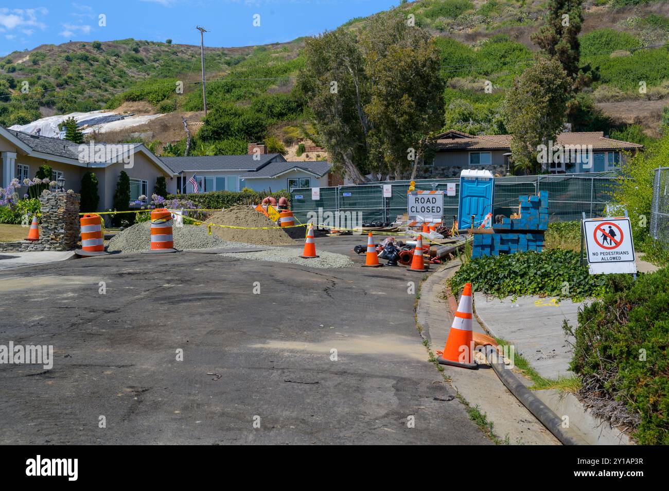 Road works digging construction in residential streets California, USA ...