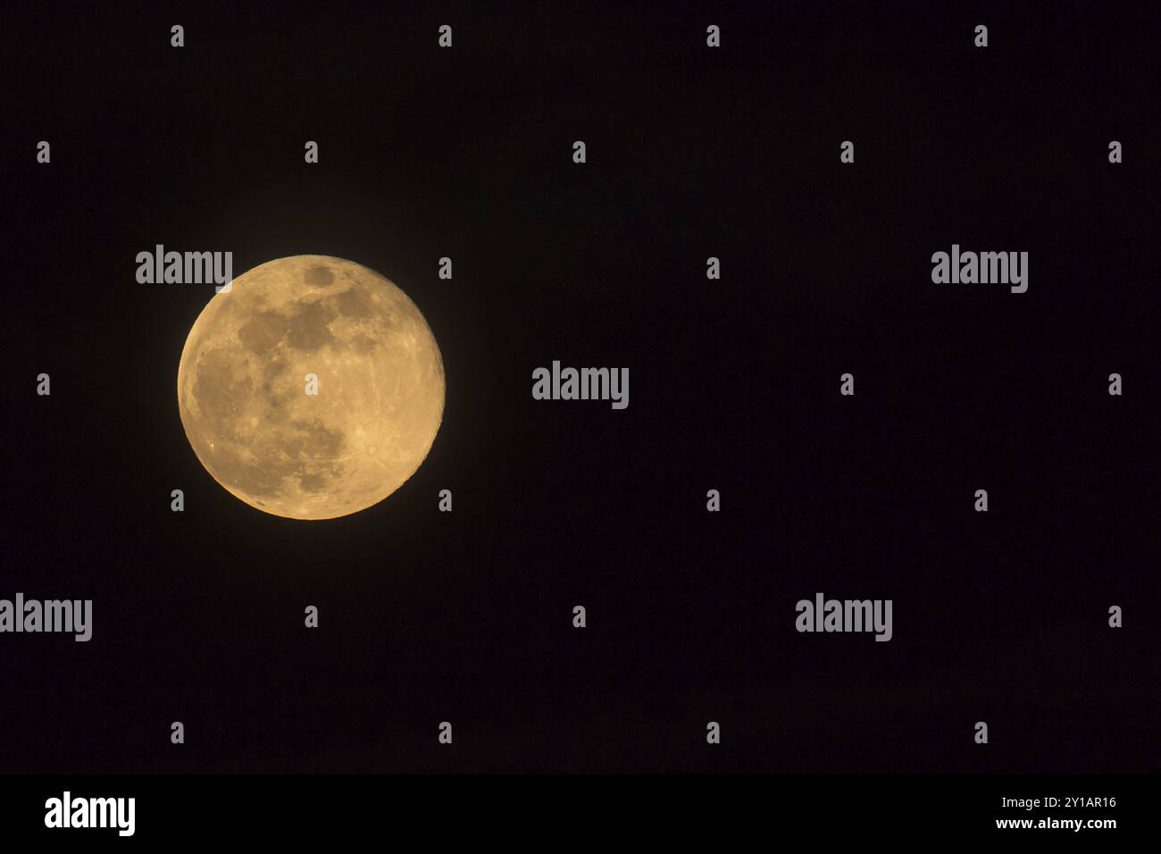 Blue Moon rising on 31 March 2018, landscape orientated image with Moon ...
