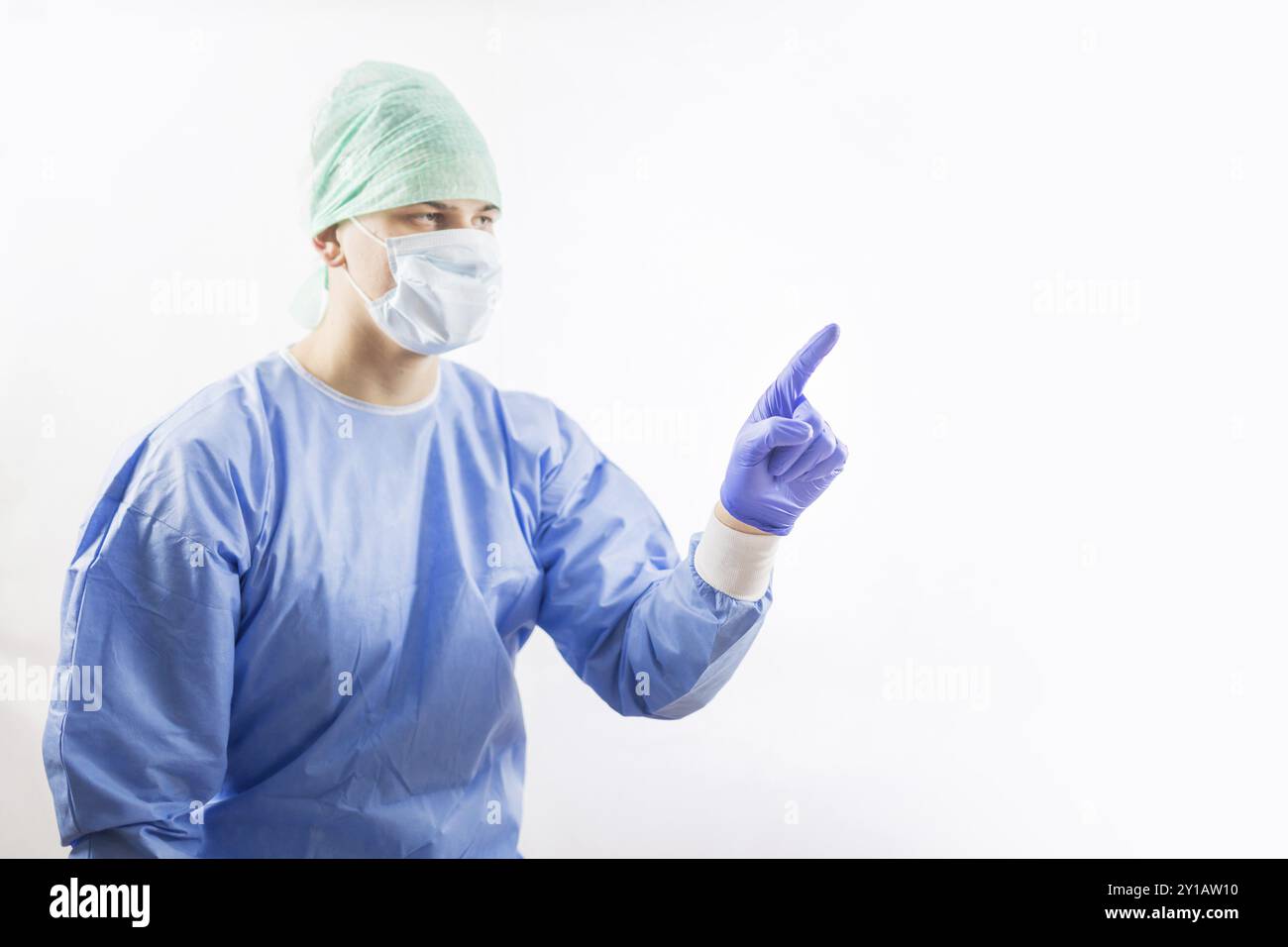 Surgeon Doctor In Sterile Gloves Preparing For Operation In Hospital