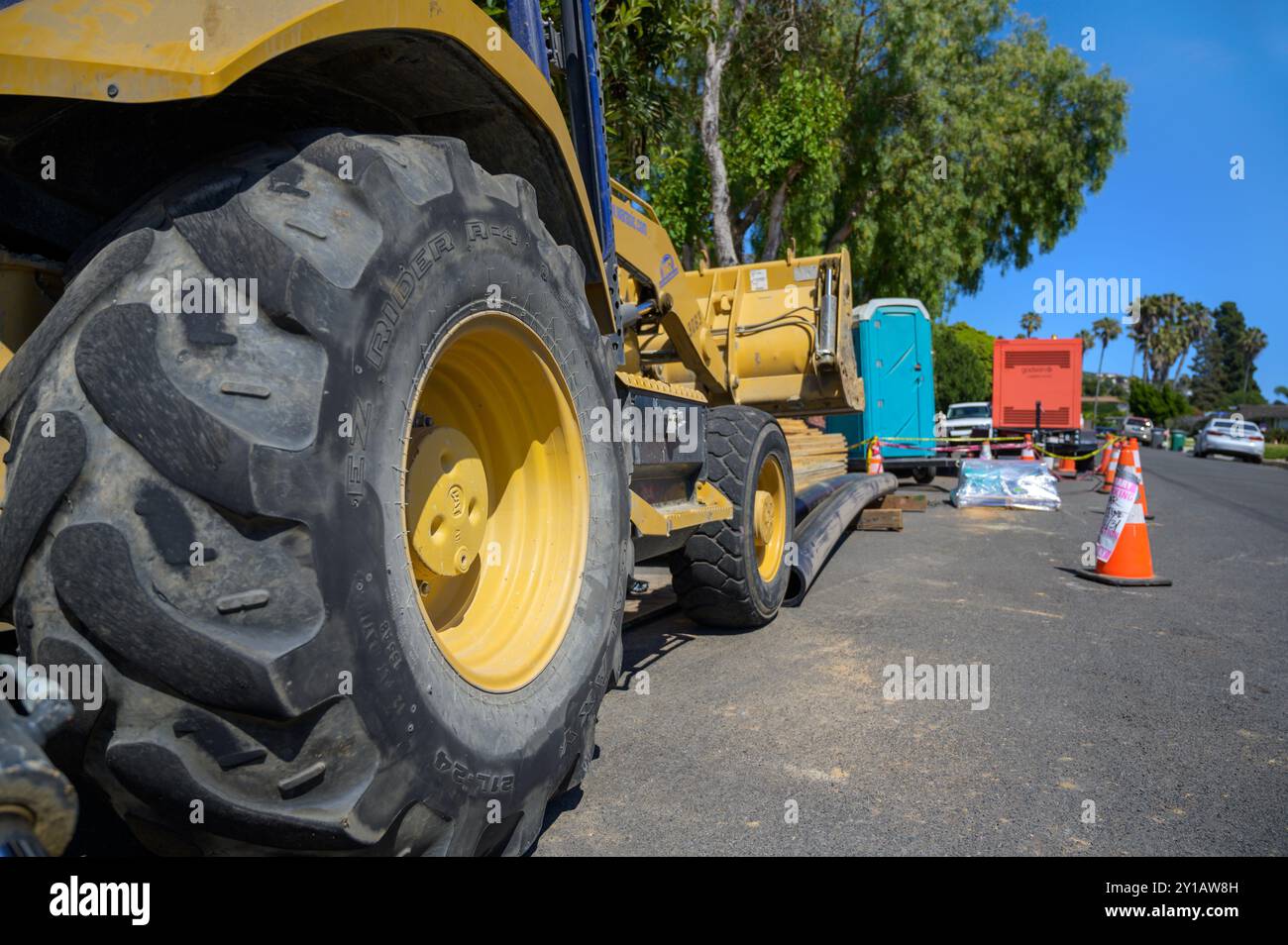 Road works digging construction in residential streets California, USA ...