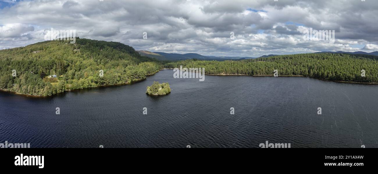 Loch at Eilein Castle, loch with island with castle ruins, drone shot ...