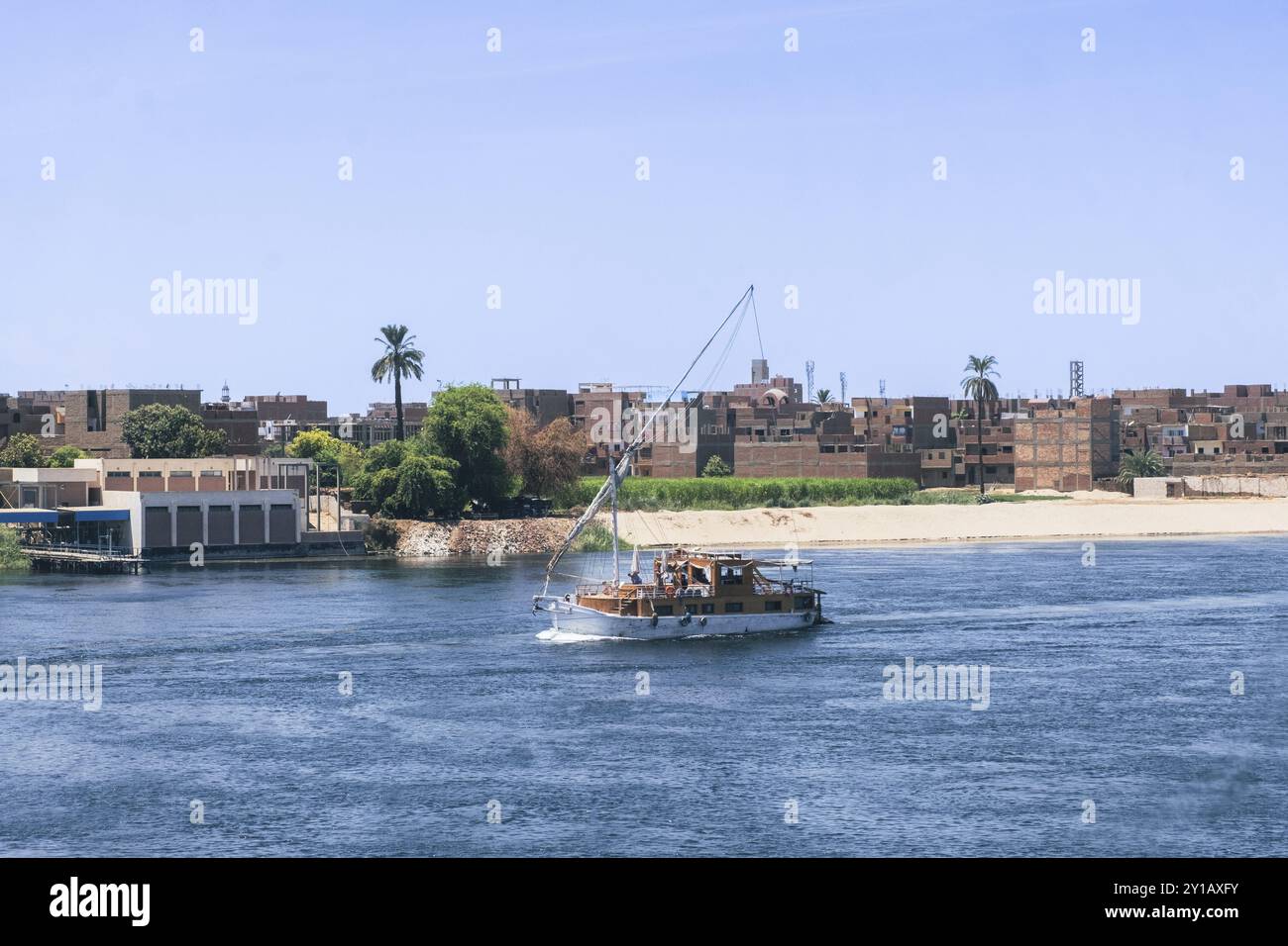 Experience Egyptian luxury with this stunning view of Luxor port from a Nile cruise ship. Ideal ...