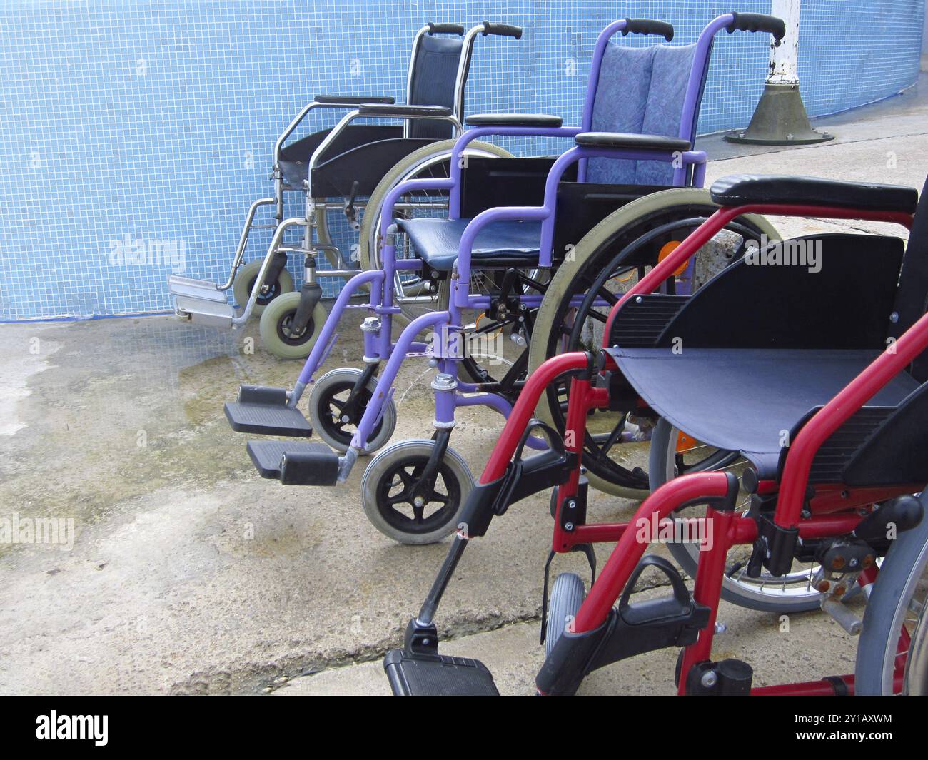 Wheelchairs on an accessible beach for transportation of people with ...